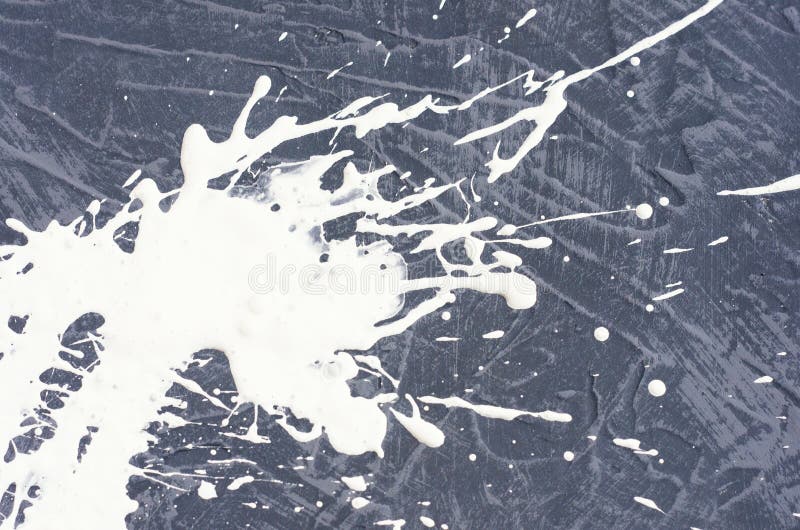 A Spot of White Spilled Paint on a Concrete Textured Surface Stock ...