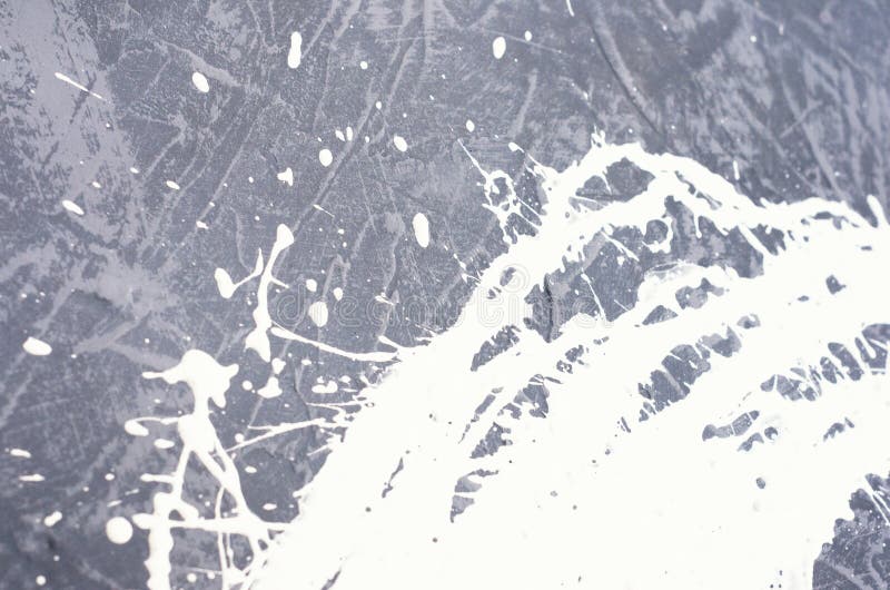 A Spot of White Spilled Paint on a Concrete Textured Surface Stock ...