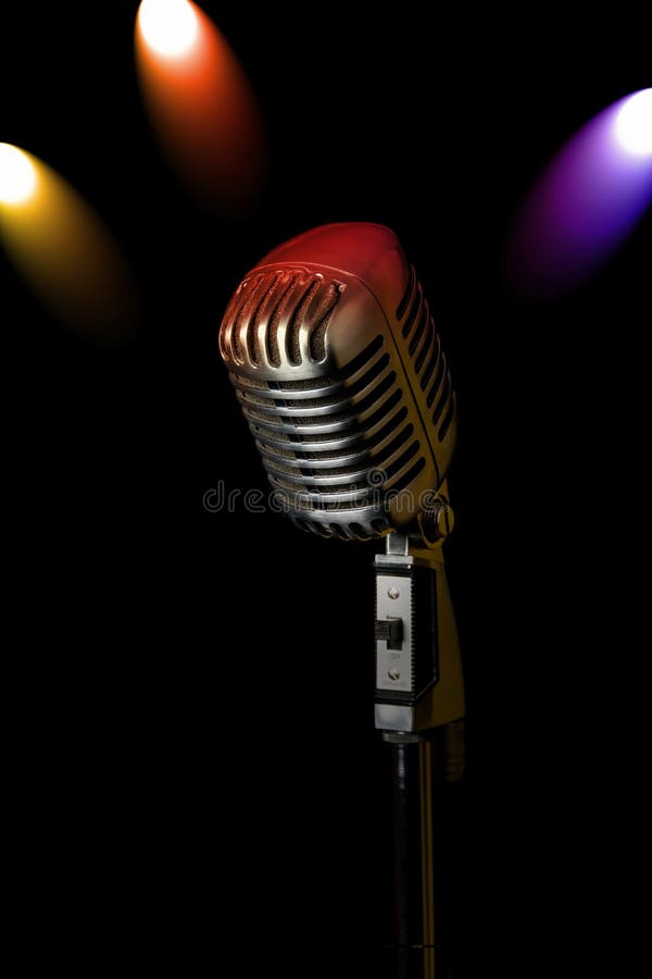 Microphone and Wooden Stool on a Stand Up Comedy Stage with Reflectors ...