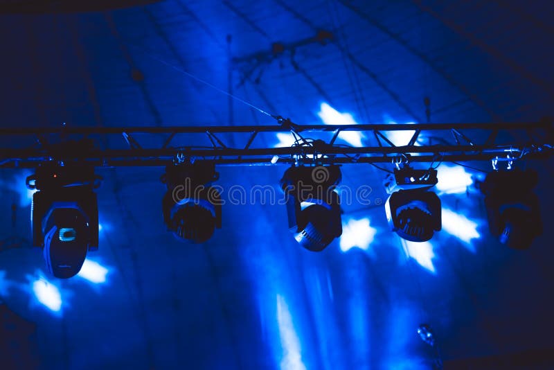 Spotlight at the concert stock image. Image of glow - 128011735