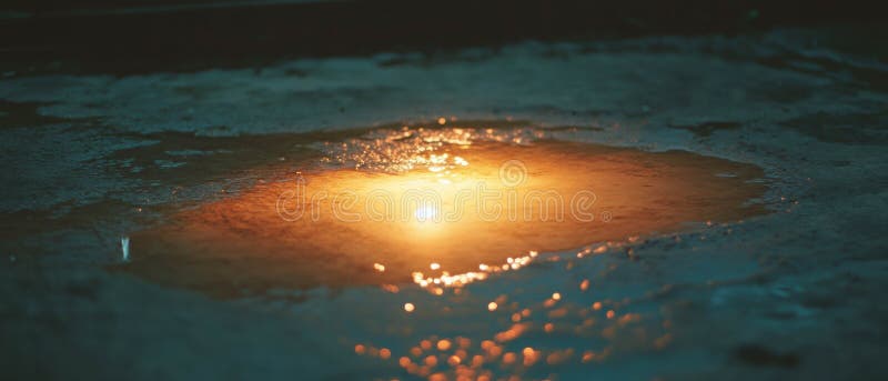 Spotlight Illuminates Water Surface, Creating Shimmering Reflections at ...