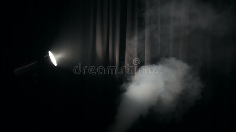 Spotlight Projecting Beam of Light through Smoke, Bright Studio ...