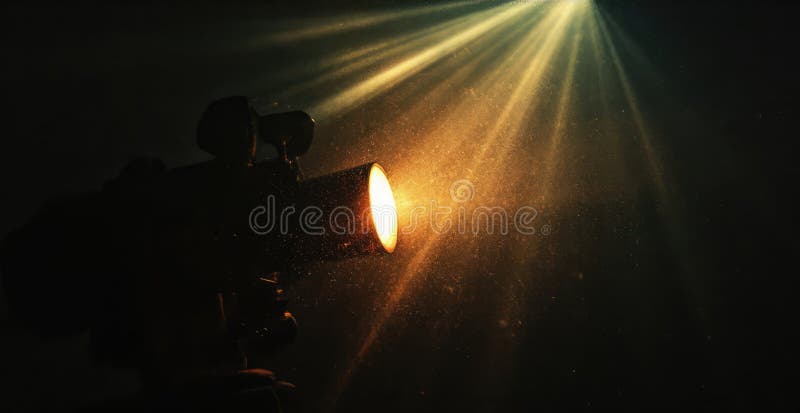 Soft Light Beams Illuminate a Darkened Space with a Spotlight Device ...