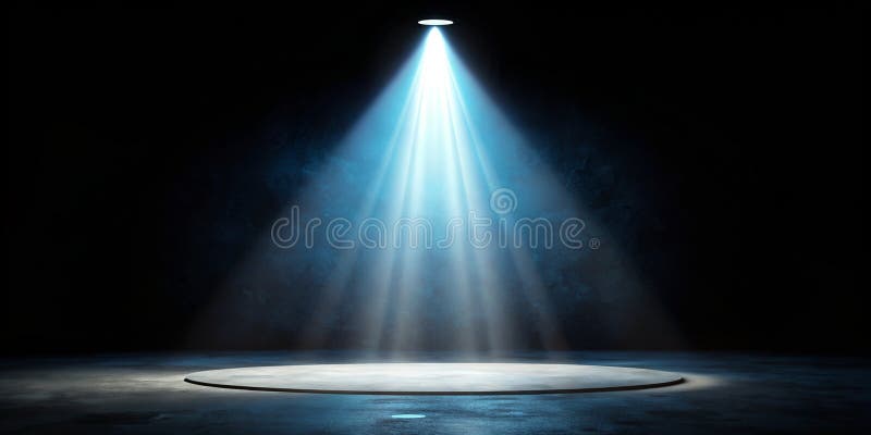 A Spotlight Shines Down on a Dark Stage the Spotlight is Bright and ...