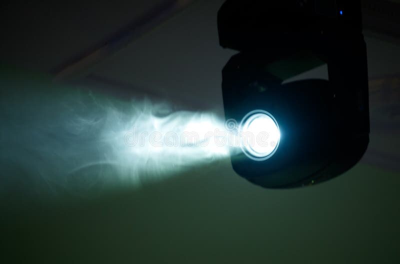 A Spotlight is Shining on a Smokey Background Stock Image - Image of ...
