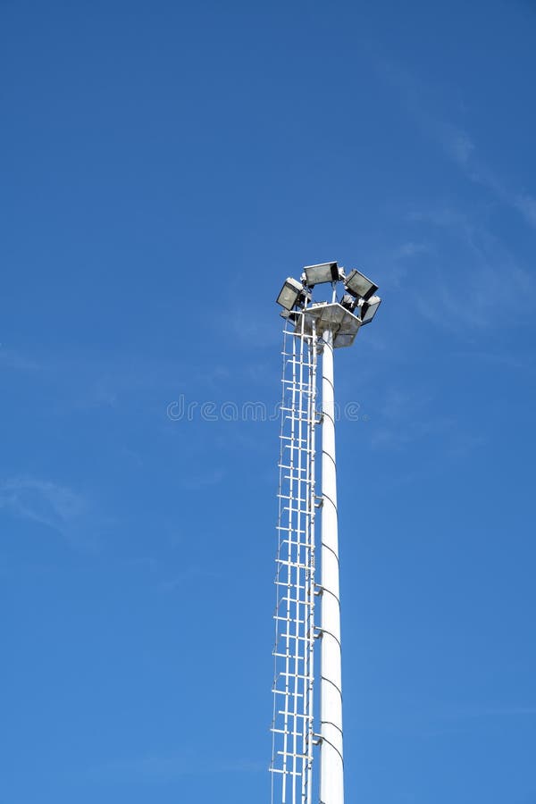 Spotlight Tower on the Blue Sky Background, Stadium Light Pole. Stock ...