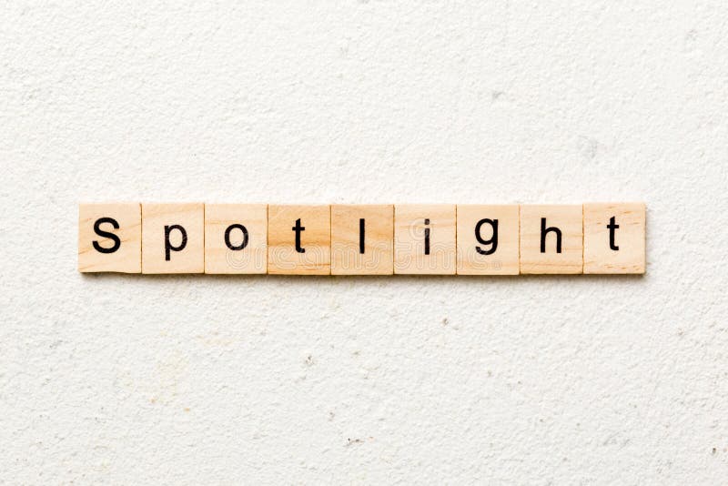 Spotlight Word Written on Wood Block. Spotlight Text on Table, Concept ...