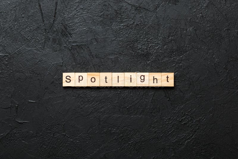 Spotlight Word Written on Wood Block. Spotlight Text on Table, Concept ...