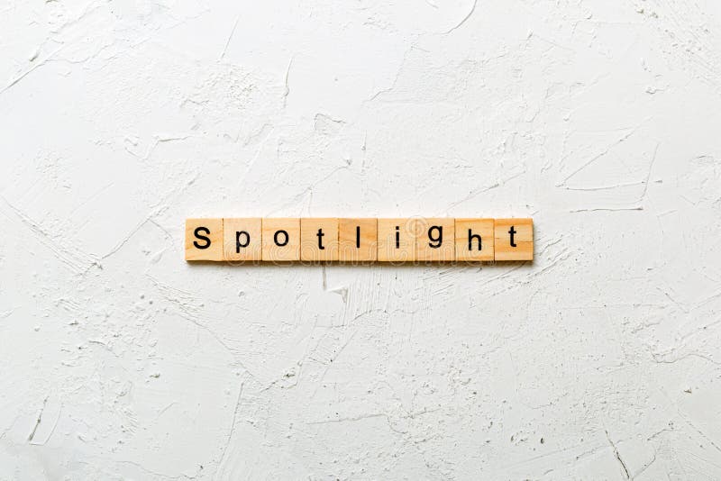 Spotlight Word Written on Wood Block. Spotlight Text on Table, Concept ...