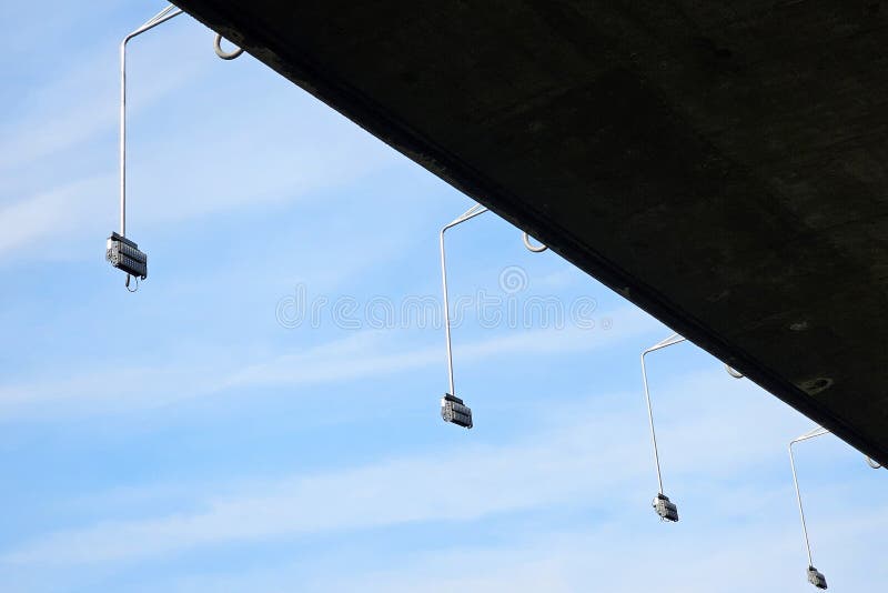 Spotlights Under the Bridge with Blue Sky. Stock Photo - Image of ...