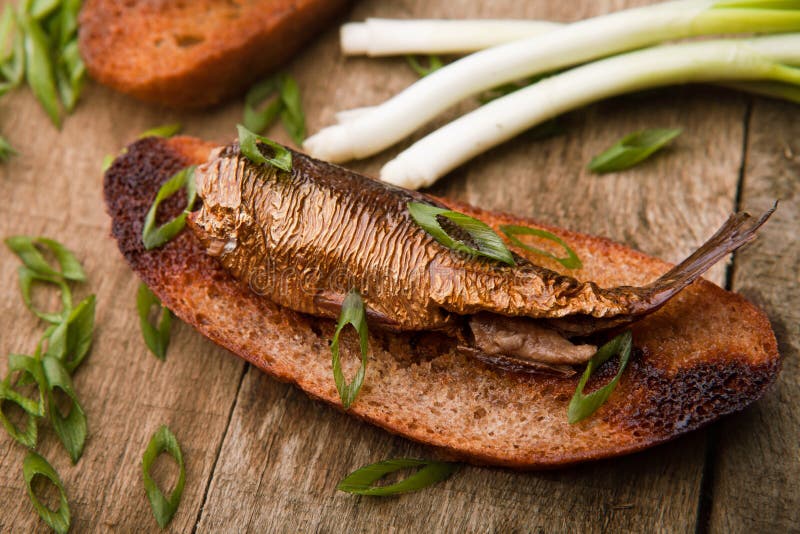 Sprat on the bred stock image. Image of fresh, yummy - 22462201