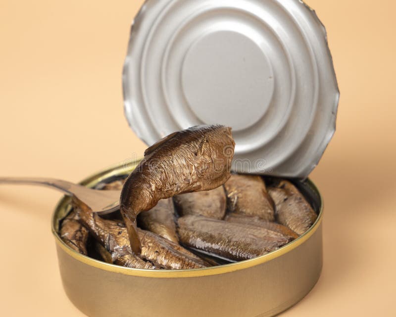 Sprat in Oil on a Fork Closeup,small Fish Delicacie Stock Photo - Image ...