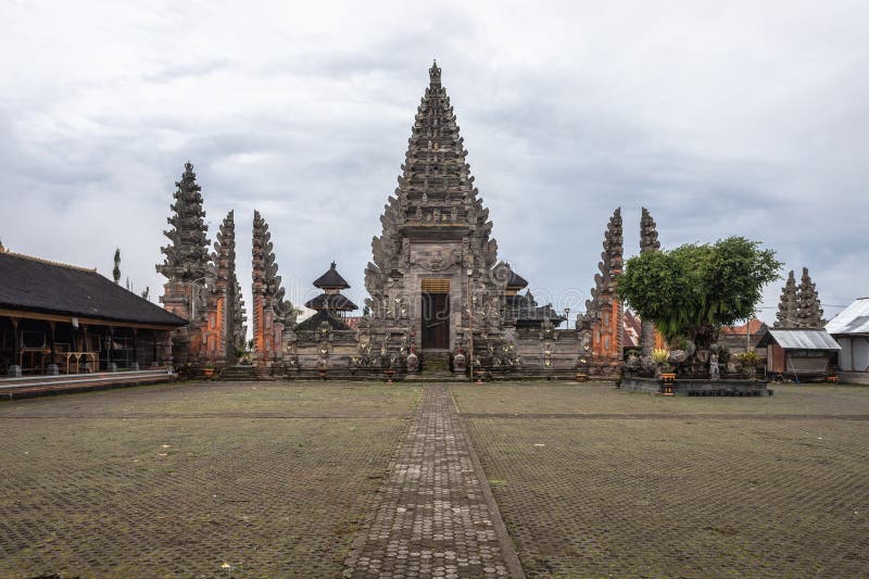 Sprawling Brick Complex Surrounded by Towering Structures Stock Photo ...