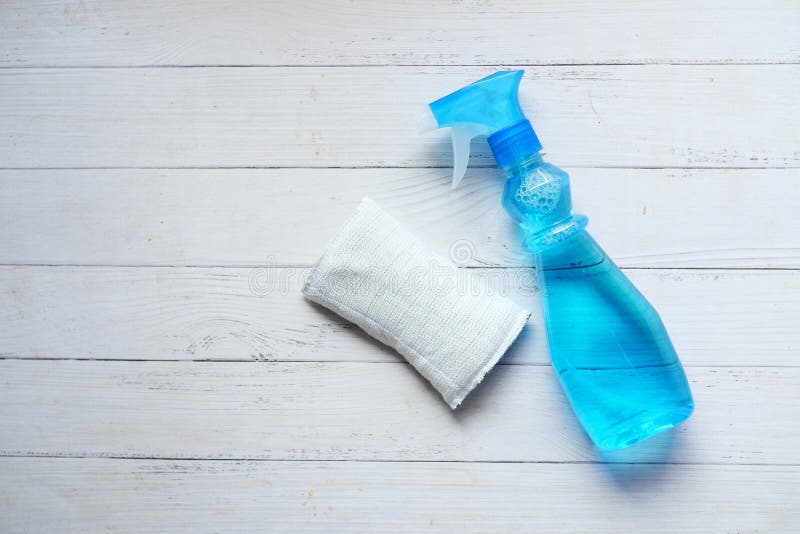 Spray Bottle and Cleaning Cloth on Table Stock Image - Image of hygiene ...