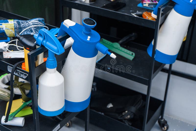 A Spray Bottle of Cleaning Solution in a Detailing Studio. a Couple of ...