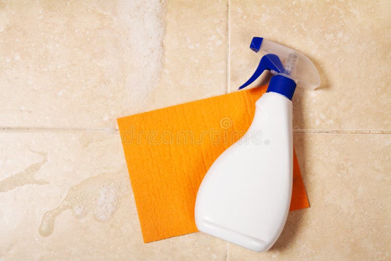 Spray Bottle is on a Orange Sponge Stock Photo - Image of cleaner ...