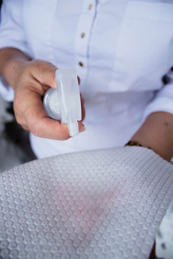 Spray bottle and a rag stock photo. Image of hands, chemical - 185591646