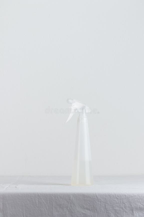 Spray bottle on the table stock image. Image of water - 246311625