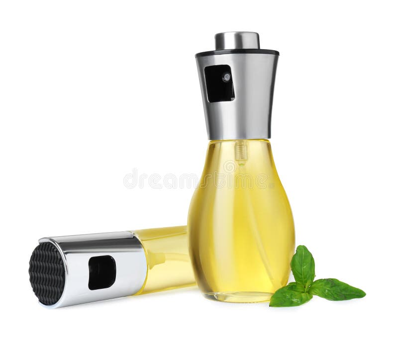 Spray Bottles of Cooking Oil and Basil Leaves on White Background Stock ...