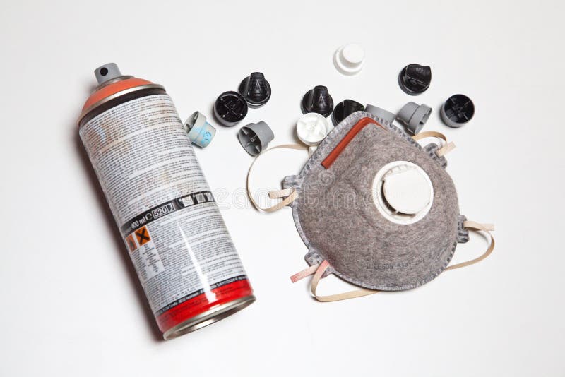 Spray cans and mask stock photo. Image of cans, orange - 13809308