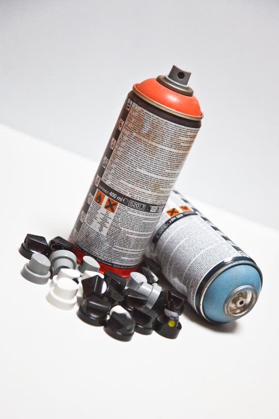 Spray cans and mask stock photo. Image of bottle, murales - 13926480