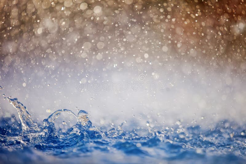 Spray from the Falling Drops on the Water Surface Stock Image - Image ...