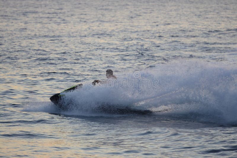 Spray from a jet ski editorial image. Image of coast - 253856610