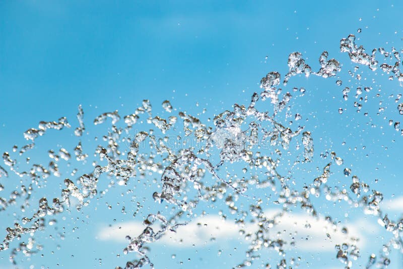 Spray of Water Against the Blue Sky Stock Image - Image of clean ...