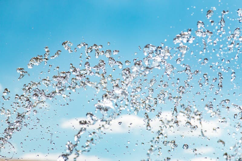 Spray of Water Against the Blue Sky Stock Image - Image of blue, water ...