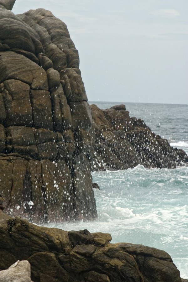 A Spray of Water Against the Rocks Stock Image - Image of foam ...