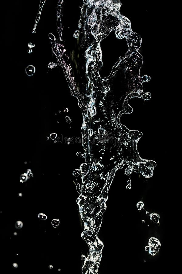 Spray Water on a Black Background Stock Image - Image of drink, clear ...