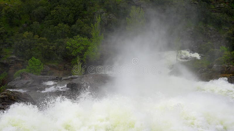 Spray Water Cloud Formed by the Strong Current of the Water Released in ...