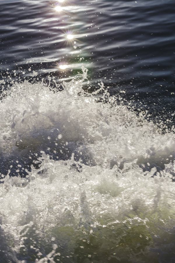Spray of Water Splashes Along the Side of the Boat Stock Image - Image ...