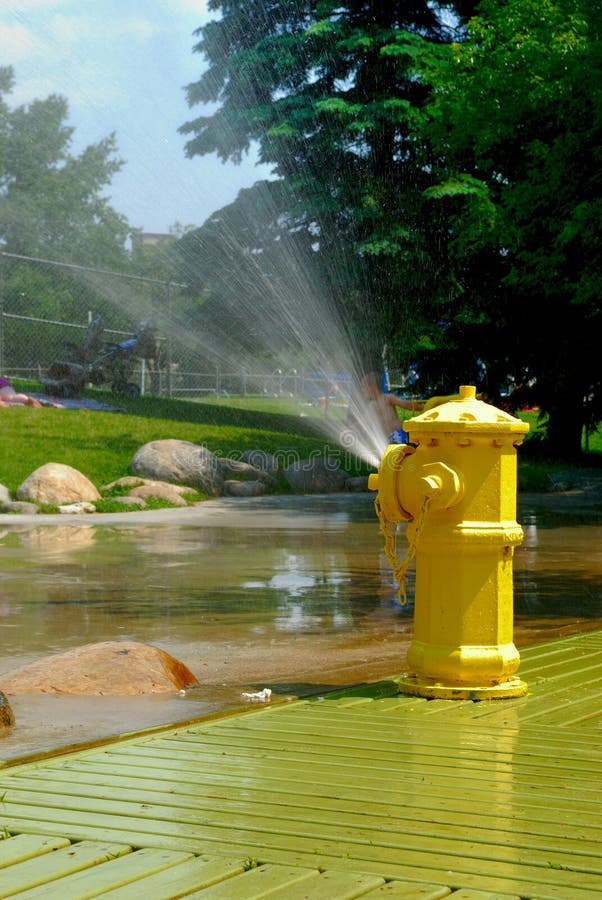 Spraying Fire Hydrant stock photo. Image of refreshing - 7719140