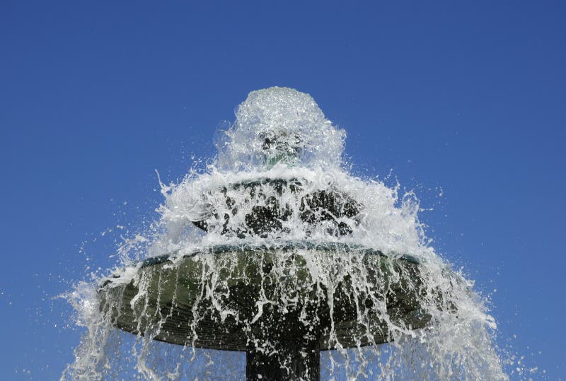 Spraying Fountain and Blue Background Stock Image - Image of statue ...