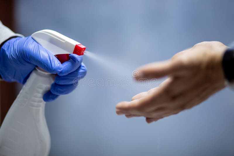 Spraying Hands with Antiseptic Solution Stock Image - Image of ...