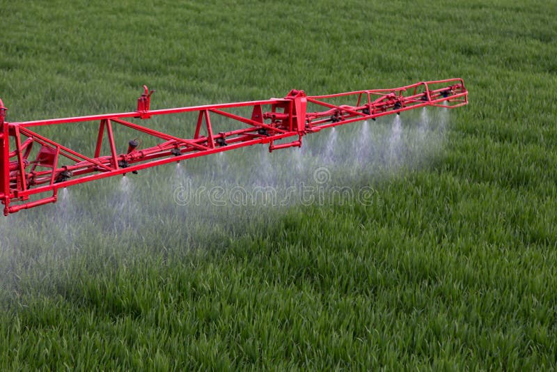 Agricultural Machine Spraying Crops Stock Photo - Image of machinery ...