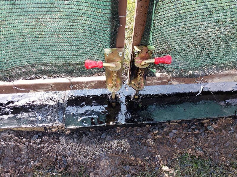 Spraying Liquid Bituminous Mastic on the Concrete Foundation for ...