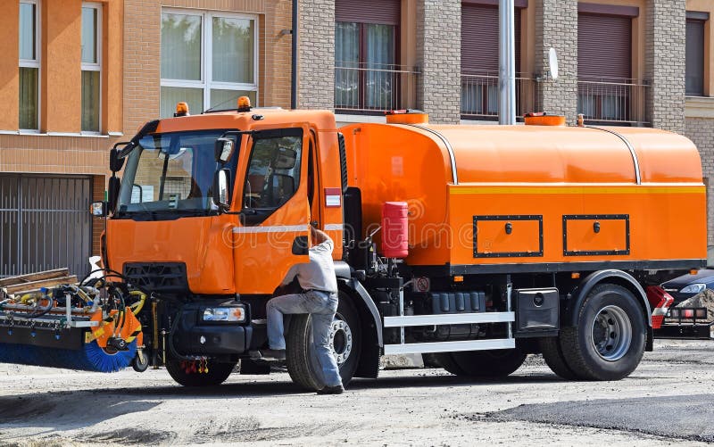 Spraying Lorries at the Road Construction Stock Image - Image of truck ...