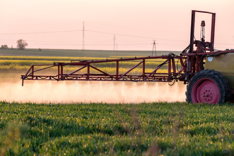 Spraying machine stock photo. Image of harvester, meadow - 72682354