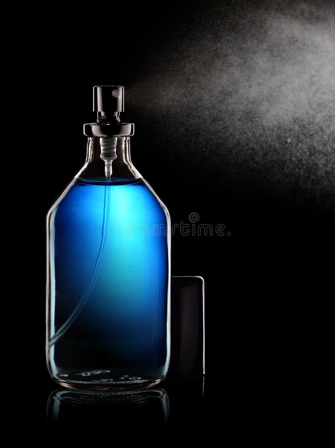 Spraying perfume bottle stock photo. Image of cologne - 104703596