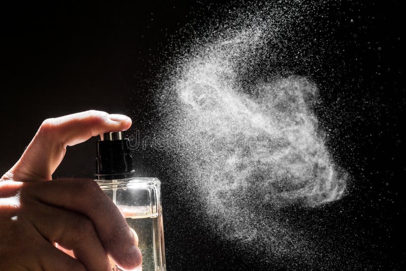 Spraying Perfume on Dark Background, Closeup Stock Image - Image of ...