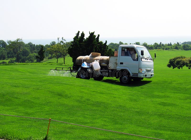 Spraying pesticides stock image. Image of sunny, holiday - 10761385