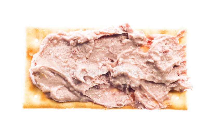 Spread patÃ© on a cracker stock photo. Image of goose - 71006172