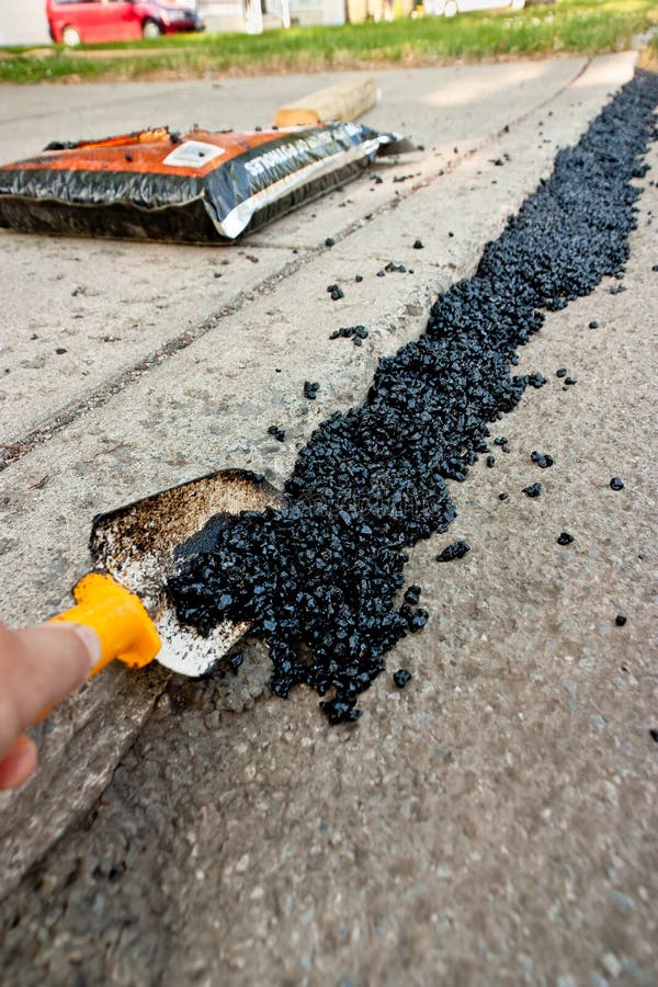 Spreading Asphalt on a Driveway Stock Image - Image of driveway, pave ...