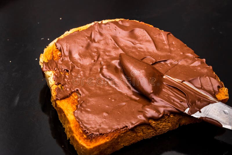 Spreading Chocolate Cream on Toasted Bread Stock Image - Image of brown ...
