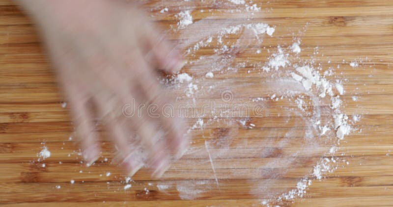 Spreading Flour on Table To Prepare Dough Stock Video - Video of ...