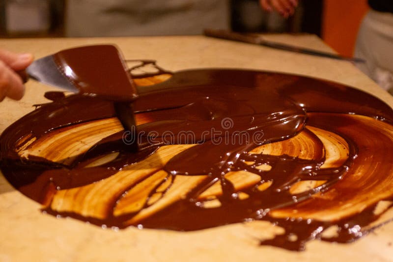 Spreading fresh chocolate stock image. Image of liquid - 298504983