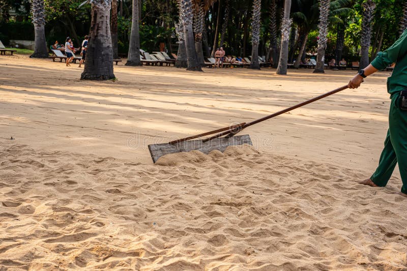 Spreading the sand stock image. Image of construction - 318465671