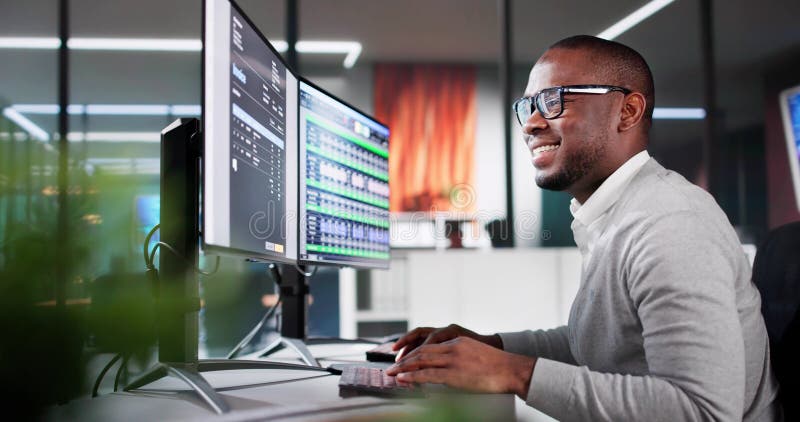 African Man Using Spreadsheet Accounting Software Stock Photos - Free ...